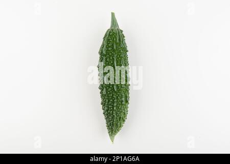 Goya or bitter melon is a long, green vegetable characterized by its ...