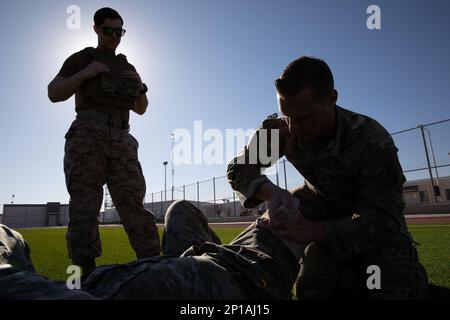 Petty Officer 1st Class Daniel Carr, from Corpus Christi TX, provides ...