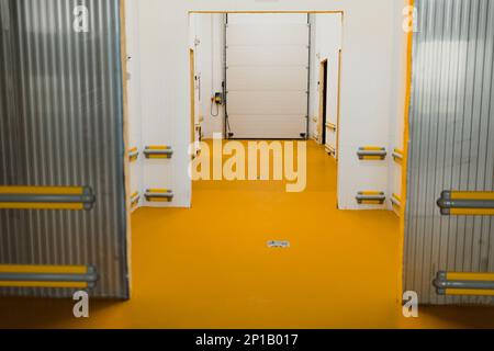 cold storage with new floor made of yellow epoxy resin Stock Photo - Alamy