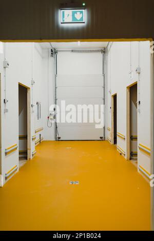 cold storage with new floor made of yellow epoxy resin Stock Photo - Alamy