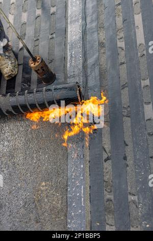 Bituminous membrane waterproofing system details and installation on flat rooftop Stock Photo ...