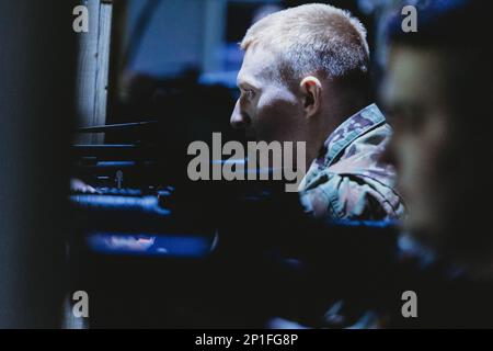 U.S. Soldiers train using the Engagement Skills Trainer II, EST II, at ...