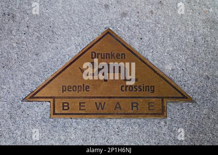 Drunken people crossing warning sign showing a drunk man crawling in ...