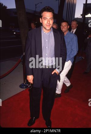 TOM SIZEMORE in HEART AND SOULS (1993), directed by RON UNDERWOOD ...