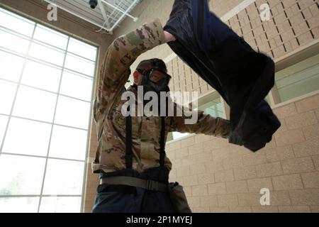 Sgt. Andrew Paradis, a heavy equipment operator in the 210th Engineer ...