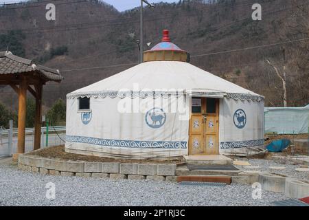 White and blue yurt near ceramics market Stock Photo - Alamy