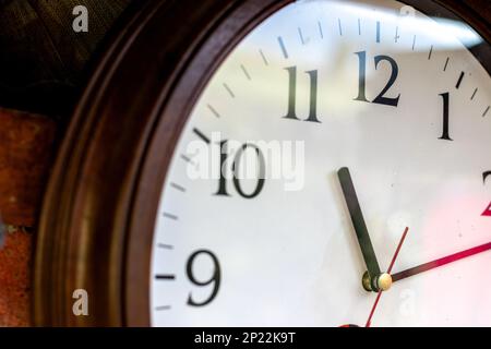 A clock with 11 and 11 on it. Obsolete Round wall clock. time concept ...