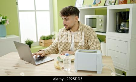 Young arab man with beard having conversation talking on the smartphone ...