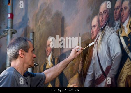 Larry Keck, a conservator with Olin Conservation, and David Olin, owner ...