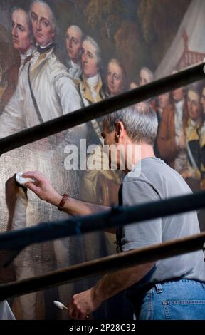 Larry Keck, a conservator with Olin Conservation, and David Olin, owner ...