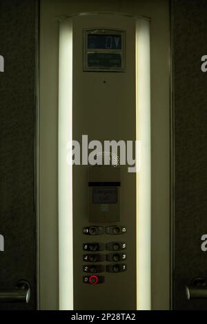 Stainless Steel Elevator Interface with Screen That Reads "Emergency ...