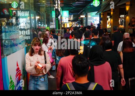 Kuala Lumpur. 4 March 2023. Crowd of people walking in bukit bintang at ...