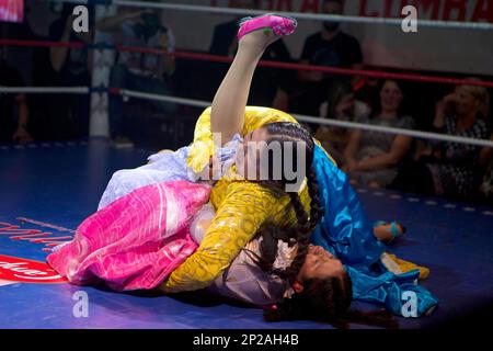 Yenny Mamani ‘Marta la Altena,’ right, is declared the winner after her ...