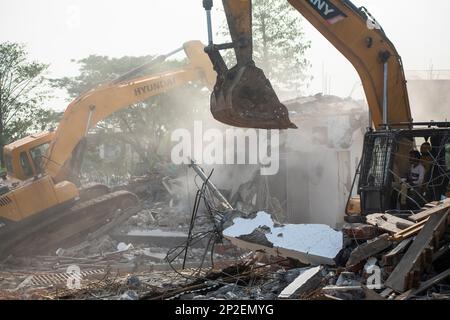 GUWAHATI, INDIA - FEBRUARY 27: Bulldozer being used to demolish alleged ...