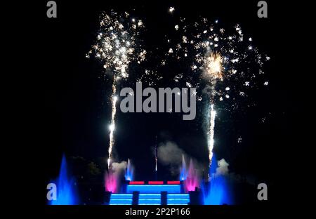 Fireworks burst above Cascade Falls during a Fourth of July fireworks ...