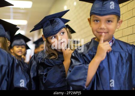Kindergartners at Barbara Jordan Elementary school stare out into the ...