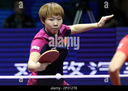 Zhu Yuling of China returns a shot to Cheng I-Ching of Chinese Taipei ...