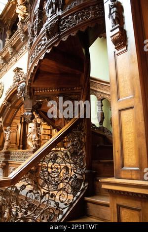 The Spiral Staircase inside Peleș Castle in Sinaia, Romania Stock Photo ...