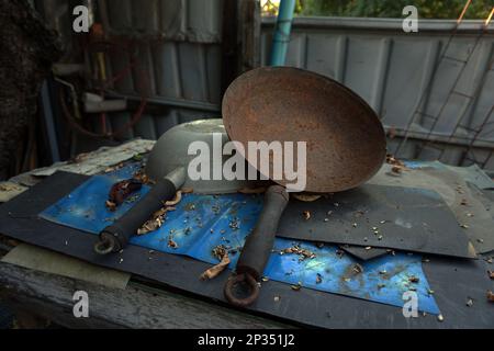 An old rusty pan that has been used for a long time Stock Photo - Alamy