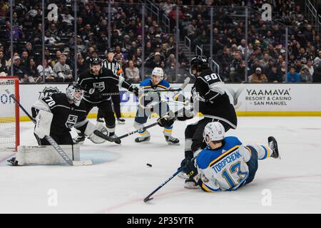 St. Louis Blues' Alexey Toropchenko (13) reaches for the puck as ...