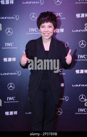 Former Chinese table tennis world champion Deng Yaping poses on the red ...