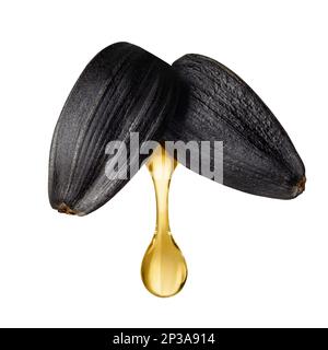 Pouring sunflower oil and falling seeds on white background Stock Photo ...