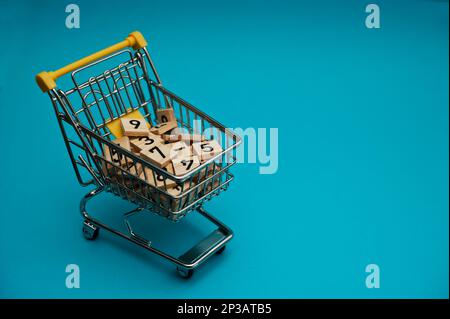 model shopping cart filled with numbers Stock Photo - Alamy