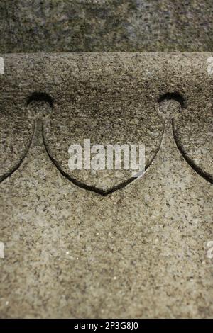 Beautiful natural stone carving witha repeating pattern in a black and ...