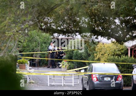 Forensic investigators with the Pinellas County Sheriff's Office work ...
