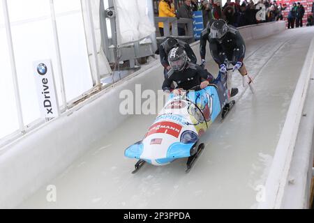 13 December 2014: The USA 3 bobsled driven by Codie Bascue with ...