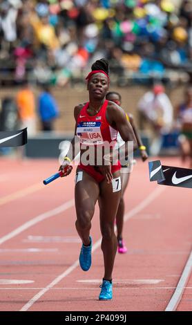 26 April 2014: Jessica Beard of the USA, runs alongside Shericka ...