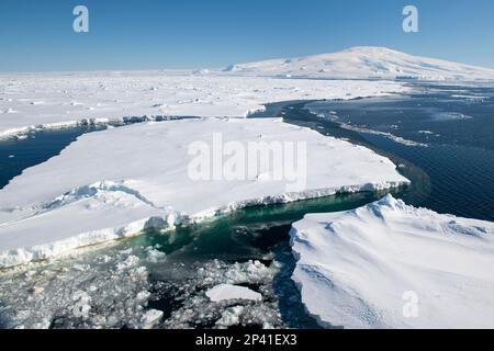 Antarctica, Amundsen Sea, Siple Island. Large iceberg with Mount Siple ...