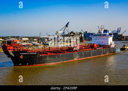 Overseas Cascade is pictured as it enters the Port of Mobile assisted ...