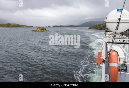 Ferry in the cold water of the fjords of southern Chile Stock Photo - Alamy