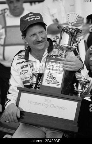 NASCAR Hall of Fame inductee Dale Earnhardt Jr., right, and Kyle Petty ...