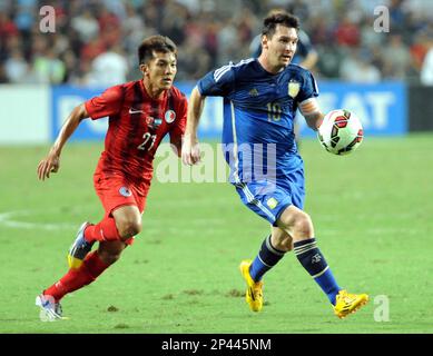 Lionel Messi is a substitute in the game during the Olympic soccer ...