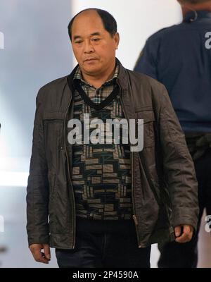 Diran Lin, father of Jun Lin leaves the courtroomat the murder trial ...