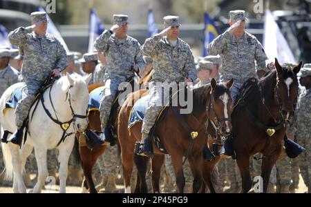 FORT CARSON, Colo. — Maj. Gen. Matthew W. McFarlane, right, commanding ...