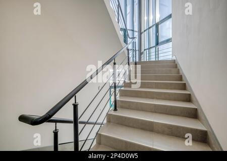 stairs emergency and evacuation exit stair in up ladder in a new office ...