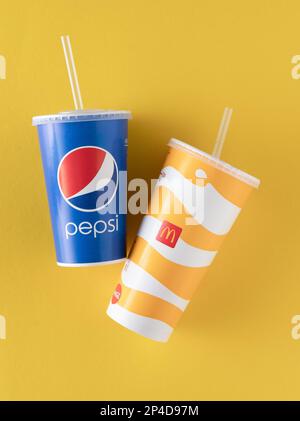 Blue paper glass with Pepsi. Takeaway carbonated drink in a cap and ...