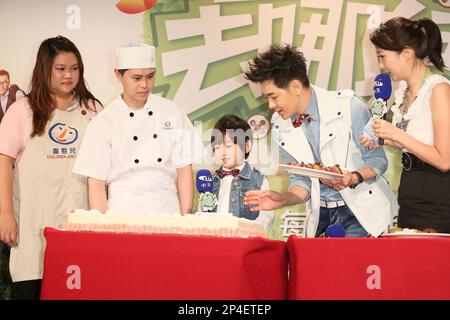 Actor Jimmy Lin and his son Kimi attend press conference of reality ...