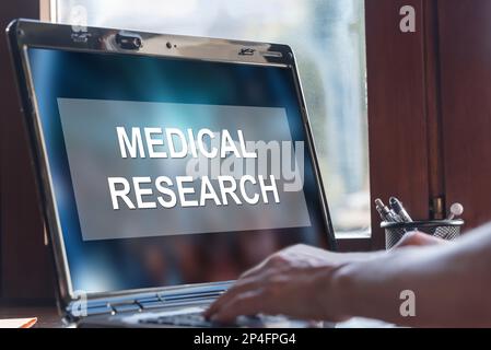 Laptop screen displaying a medical research concept Stock Photo - Alamy
