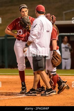 Alabama head coach Patrick Murphy talks with his staff during an NCAA ...