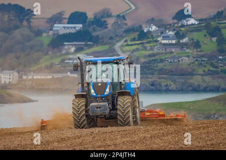 Martin O'Regan sowing spring oats near Kinsale, Co. Cork, March '23 ...