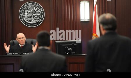 Michael Dunn, right, and his defense attorney Cory Strolla view a ...