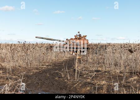 Wartime signs. Remains of destroyed military equipment on the outskirts ...