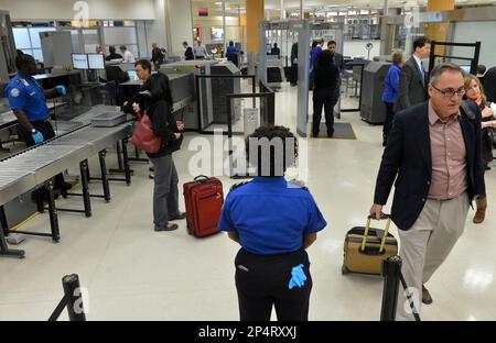 The passengers on TSA Security Checkpoint line at Orlando International ...