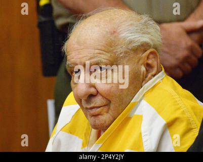 Convicted serial killer Joseph Naso is taken away after being sentenced ...