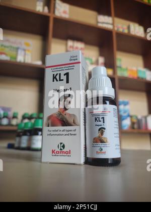 Closeup image of homeopathic medicine consisting of the pills and a ...