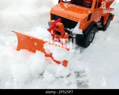 a blade pushes the snow Stock Photo - Alamy